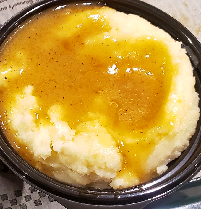 Mashed potatoes with gravy so good you'll consider drinking it like soup. Comfort in a bowl that speaks directly to your soul.