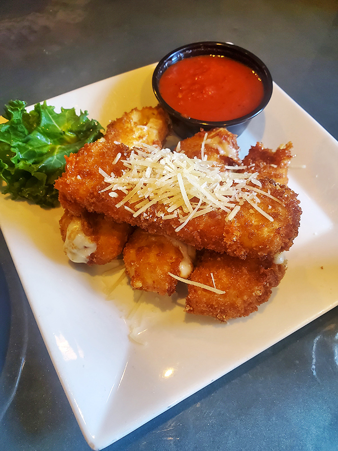 These aren't your average mozzarella sticks&mdash;they're mozzarella planks, architectural marvels of crispy exterior giving way to molten cheese that stretches for days.