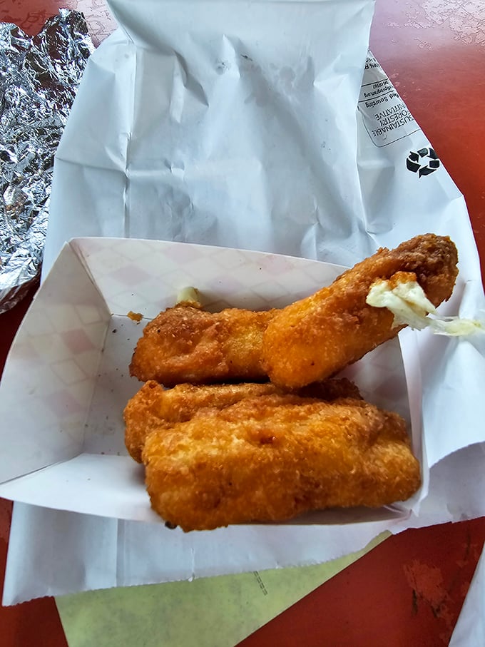 Mozzarella sticks that actually contain real cheese—a revolutionary concept! The golden exterior gives way to a molten interior that stretches for days.