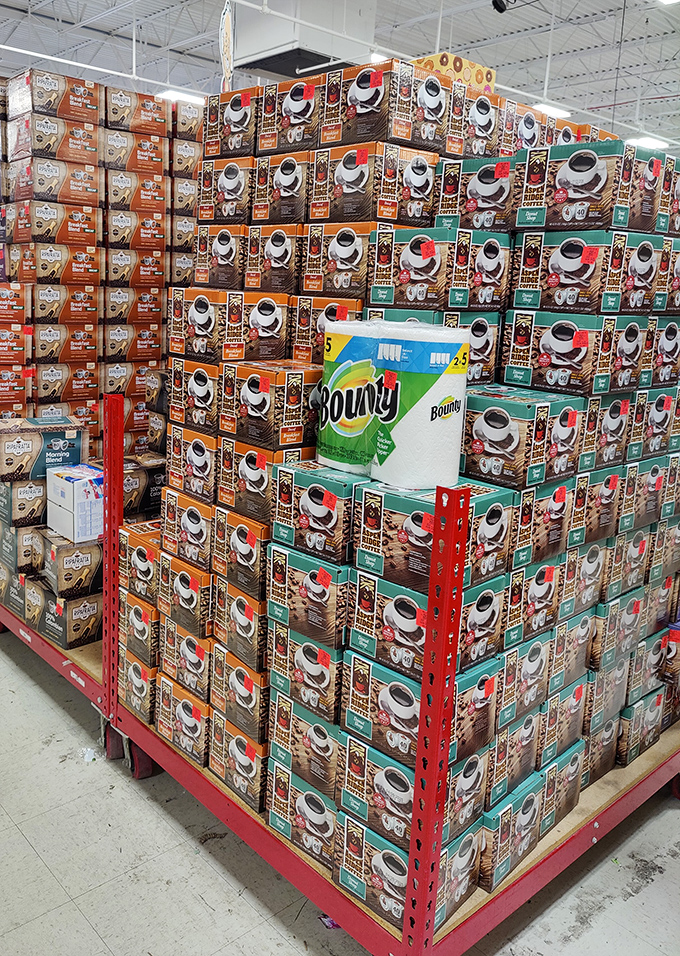 Coffee mug mountain! Enough caffeine vessels to fuel an entire office building's Monday morning, stacked with the precision of caffeinated Jenga.