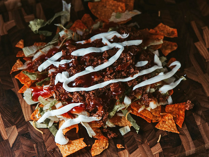 Taco salad that throws moderation to the wind&mdash;a glorious mess of seasoned beef, crisp lettuce, and cool sour cream that makes every bite a fiesta.