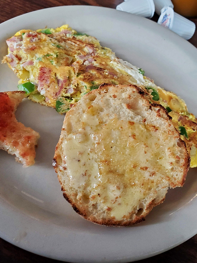 An omelette that knows its purpose in life&mdash;to deliver maximum flavor with minimum pretension. The toast is just showing off. 