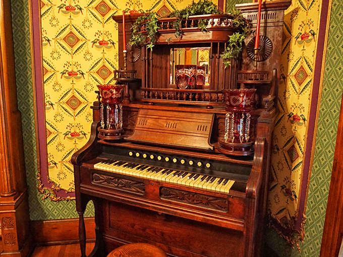 This isn't just an organ—it's a time machine with keys. The intricate woodwork and gleaming pipes stand ready to fill the room with melodies from another era.