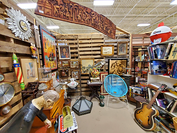 Rustic wood, vintage instruments, and mid-century furniture create a bohemian hideaway. This booth feels like stepping into a 1970s artist's loft where Jack Kerouac might have crashed.