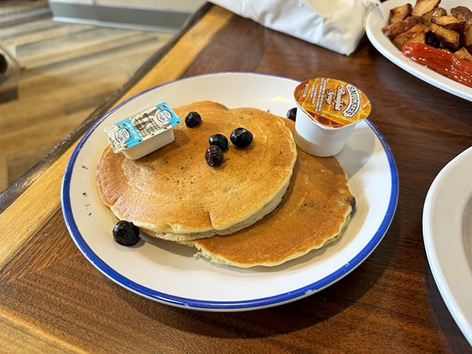 Pancakes that look like they're auditioning for a breakfast commercial. Those blueberries aren't just toppings&mdash;they're jewels.