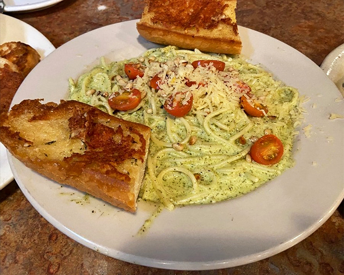 Pasta and pesto proving that sometimes the simplest combinations create the most memorable flavor symphonies.