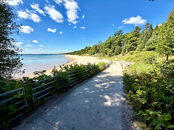 The boardwalk to bliss. This accessible path guides visitors through dune grasses to reveal the park's crown jewel&mdash;a pristine Lake Michigan beach.