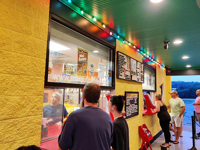 The concession line&mdash;that beautiful intermission ritual where strangers become temporary neighbors united in the universal quest for perfectly buttered popcorn.