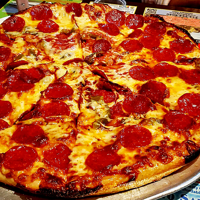 The pepperoni curls into perfect little cups of savory goodness, creating flavor reservoirs that make each bite a tiny celebration.