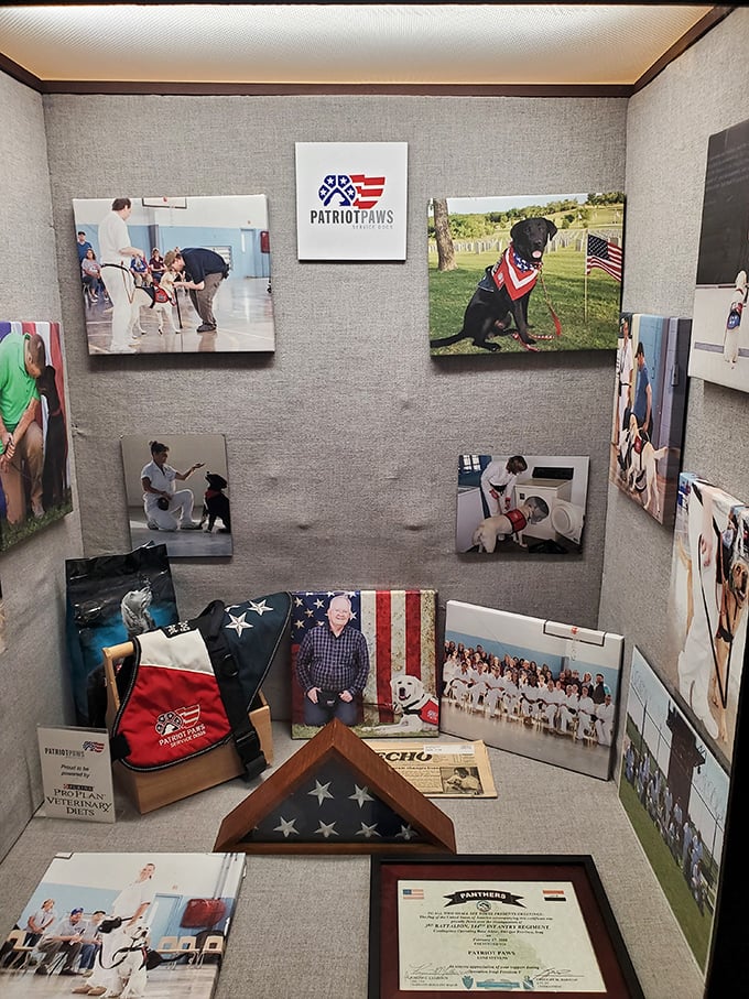 The Patriot Paws exhibit highlights a redemptive side of prison life, where inmates train service dogs for disabled veterans.