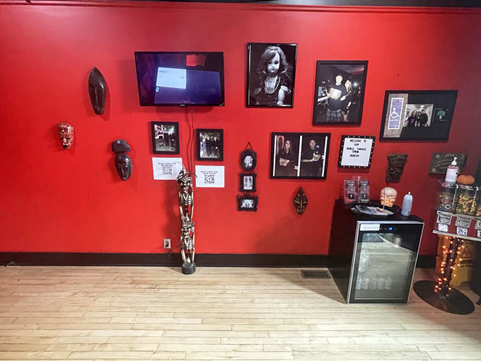 A gallery wall that would make Vincent Price proud. Each frame tells a story, and not the kind with happy endings.