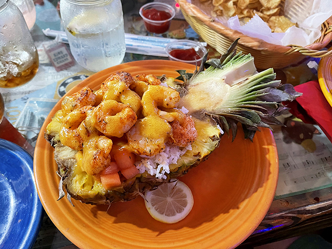 Tropical paradise on a plate&mdash;shrimp nestled in a hollowed pineapple boat, sailing straight to your taste buds.