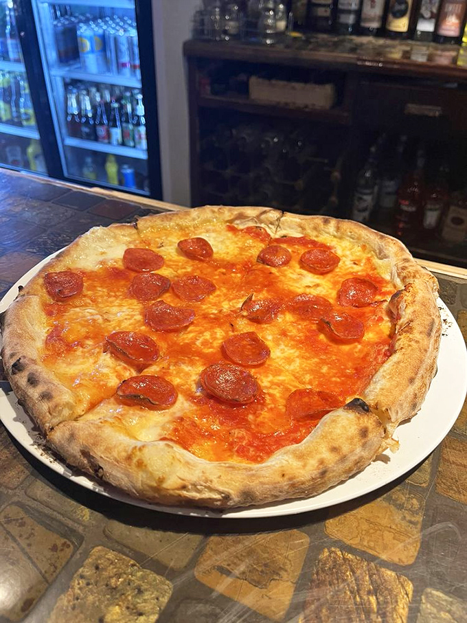 Pizza that achieves the golden ratio of crispy-to-chewy crust. Those pepperoni cups holding tiny pools of delicious oil are little flavor jackpots.