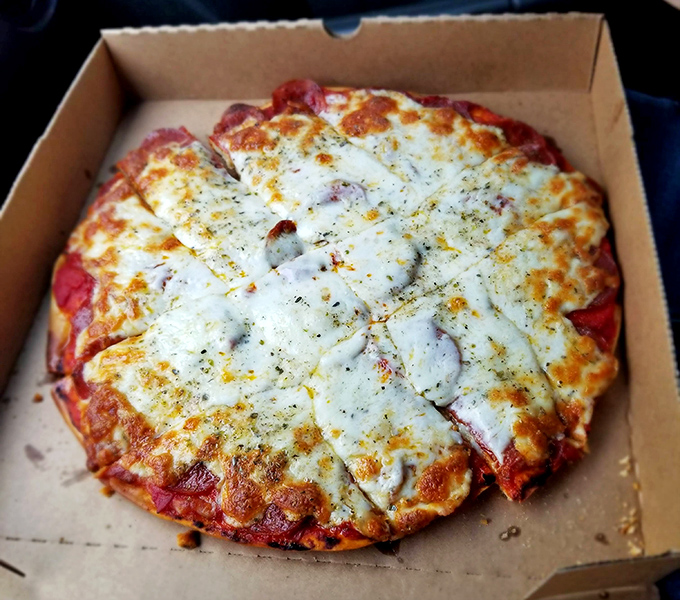 This pizza doesn't need artisanal credentials or imported flour &ndash; it's honest-to-goodness comfort in circular form.