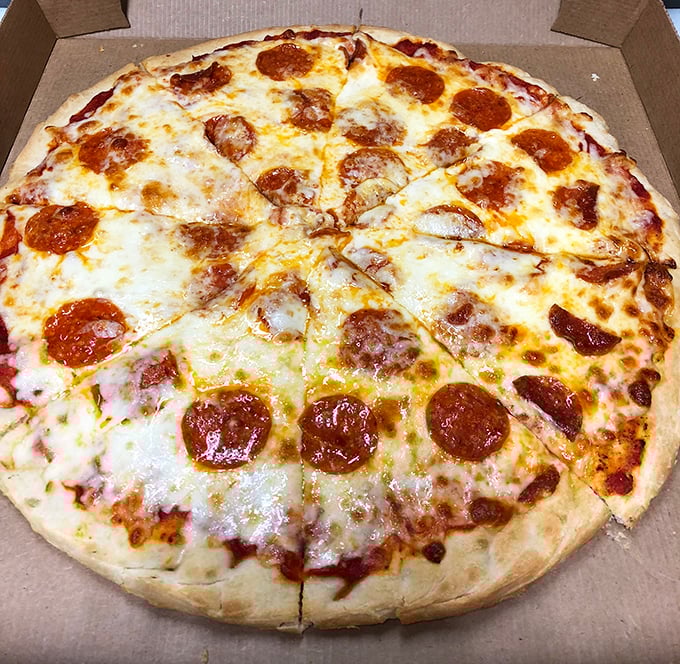 Pizza perfection doesn't need fancy toppings or artisanal pretense. This pepperoni pie speaks the universal language of "I'm going to need another slice."