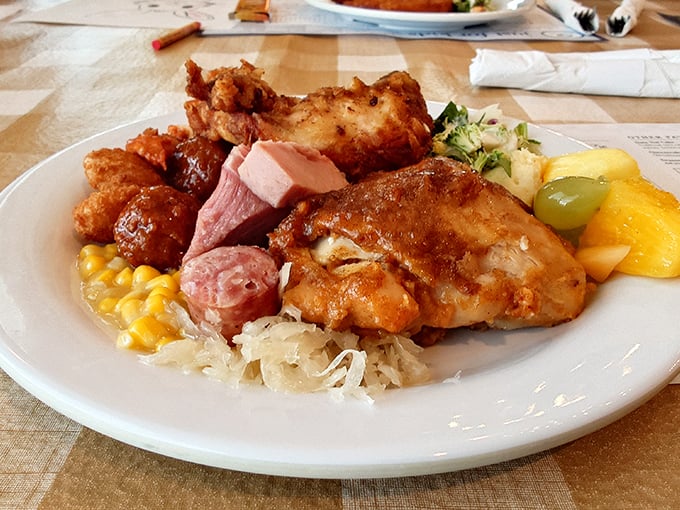 A golden-fried chicken breast lounges on the plate like it's on vacation, surrounded by potato chunks that have achieved the perfect crisp-to-fluffy ratio.