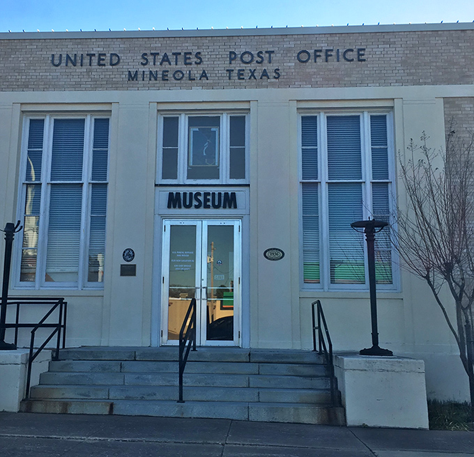Mineola's former post office now serves as the town's museum, its limestone facade and classic government architecture preserving stories rather than delivering them.