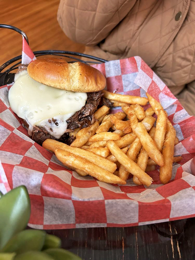 This isn't just a sandwich—it's pot roast architecture, where tender beef and melty cheese create the ultimate handheld comfort food experience.