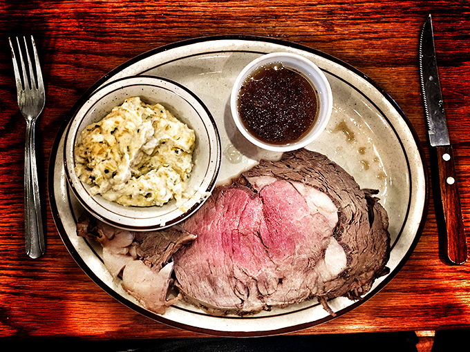 The prime rib that launched a thousand road trips. Perfectly pink, accompanied by creamy potato salad and that essential jus&mdash;this is meat meditation at its finest.