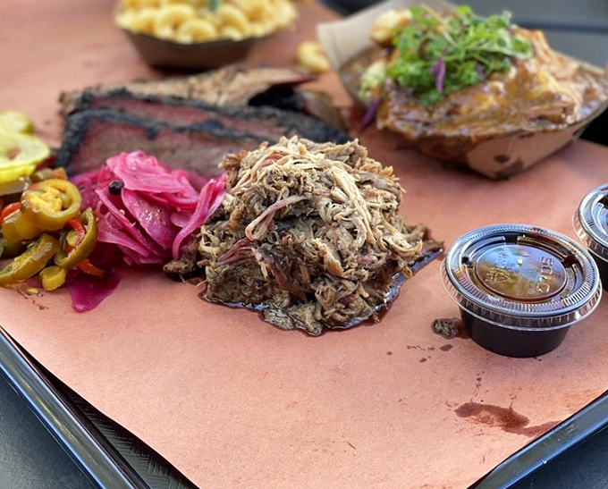 A barbecue plate that tells a story of smoke, time, and craftsmanship. The pickled vegetables aren't garnish—they're essential supporting actors.