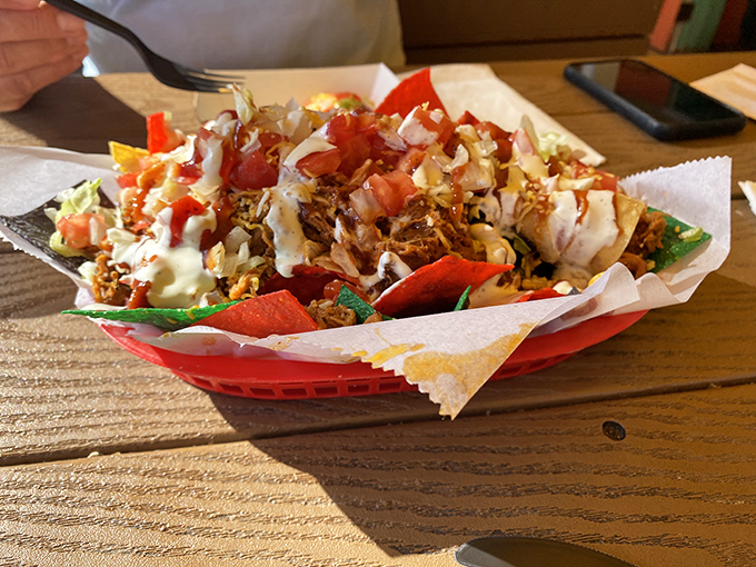 These pulled pork nachos aren't messing around. They're the architectural marvel of appetizers&mdash;layers of deliciousness threatening to topple.
