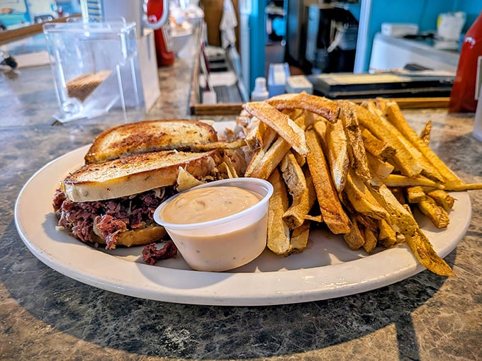 This pulled pork sandwich with hand-cut fries isn't just lunch &ndash; it's edible therapy that makes Monday meetings seem almost bearable.