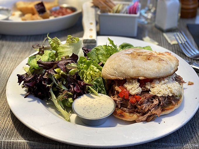 A pulled pork sandwich so photogenic it probably has its own Instagram account by now.
