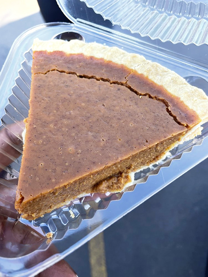This slice of pumpkin perfection isn't just pie&mdash;it's portable nostalgia, packaged in a convenient to-go container for roadtrip emergencies.