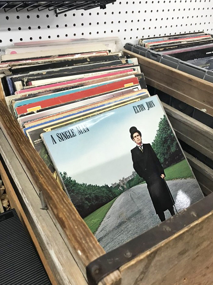 Vinyl treasure hunting at its finest! Elton John's "A Single Man" front and center, waiting to spin tales of yesteryear.