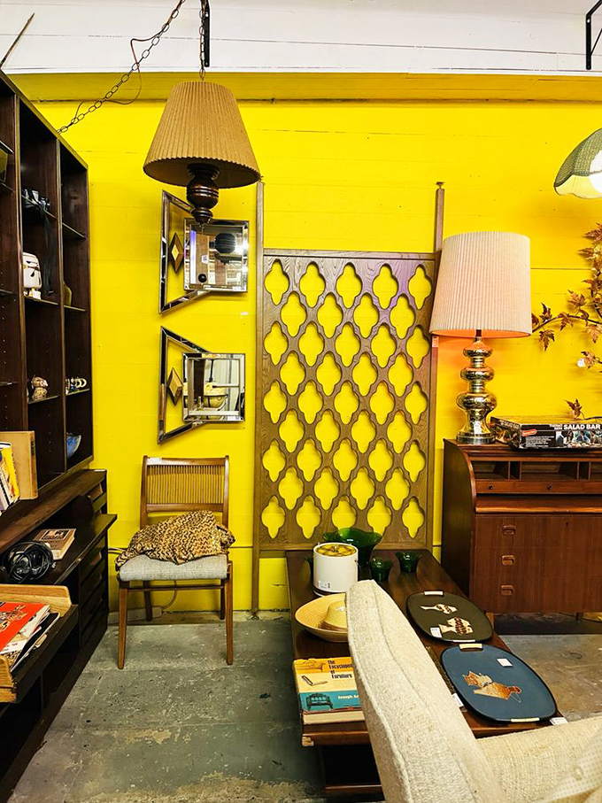 Mid-century modern meets sunshine yellow in this retro vignette. Don Draper would approve of that room divider&mdash;perfect for hiding your Old Fashioned.