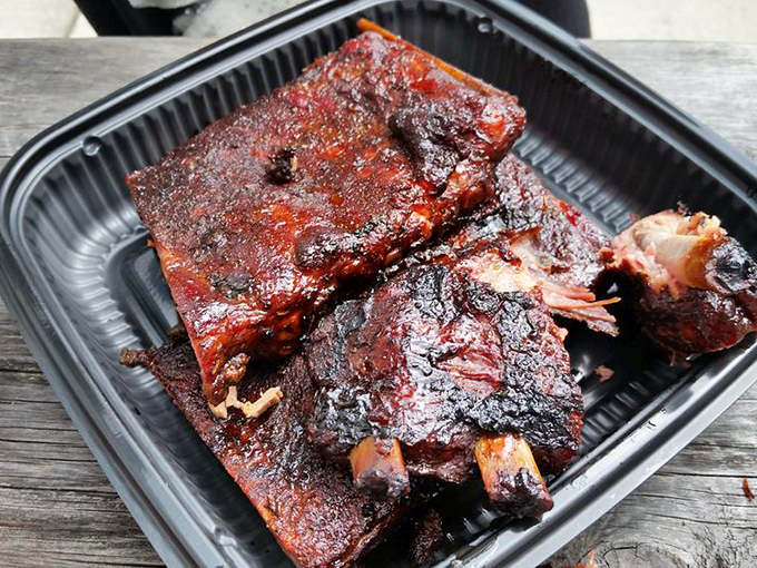 These ribs have the perfect bark-to-meat ratio, glistening with a lacquer that would make furniture makers jealous.