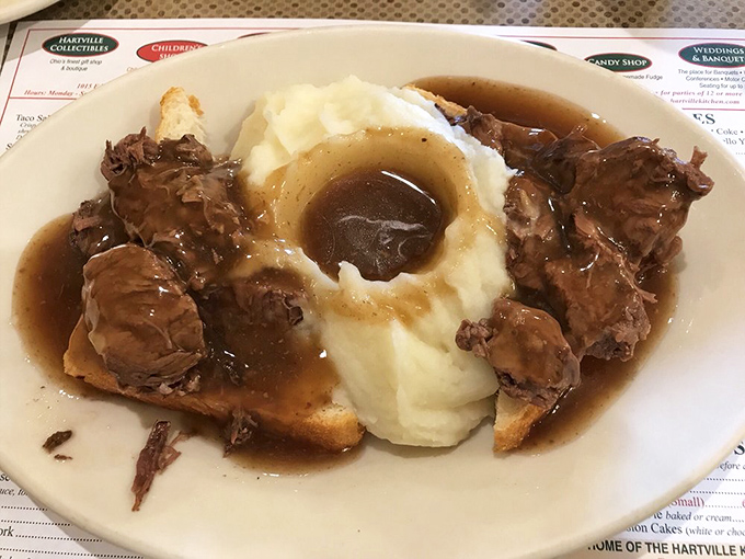 Tender roast beef swimming in rich gravy alongside creamy mashed potatoes - Sunday dinner perfection on weekdays.