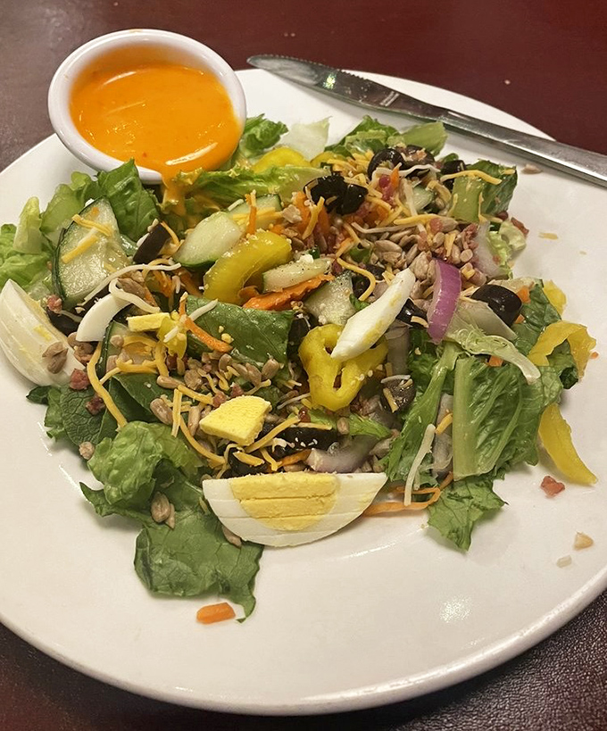 This isn't just a salad&mdash;it's a colorful convention where vegetables, cheese, and egg have gathered to discuss important matters of taste and texture.