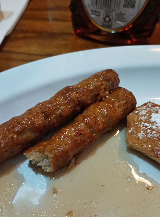 Breakfast sausage links glistening with promise, ready to transport you back to Sunday mornings when calories didn't count and naps were mandatory.