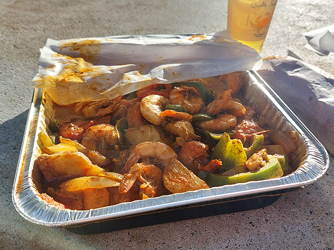 A sizzling pan that's basically a seafood block party. Shrimp mingling with peppers and onions in what might be the tastiest neighborhood gathering ever.