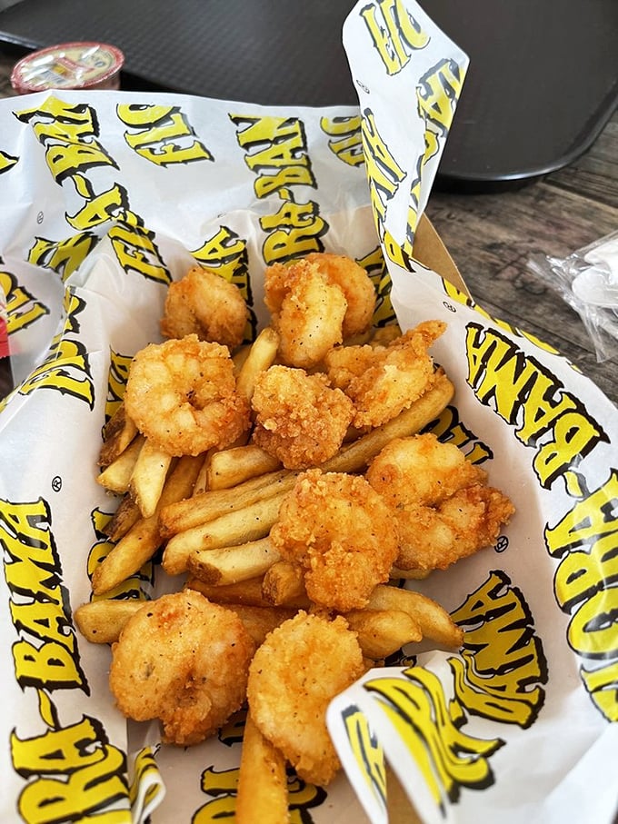 Golden-fried shrimp nestled among crispy fries &ndash; the kind of basket that makes you wonder why you ever eat anything else.