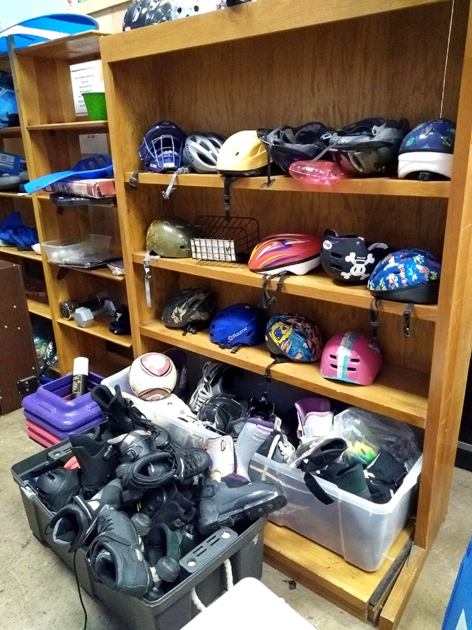 Safety first! A helmet collection that proves one person's outgrown bike gear is another's budget-friendly brain protection.
