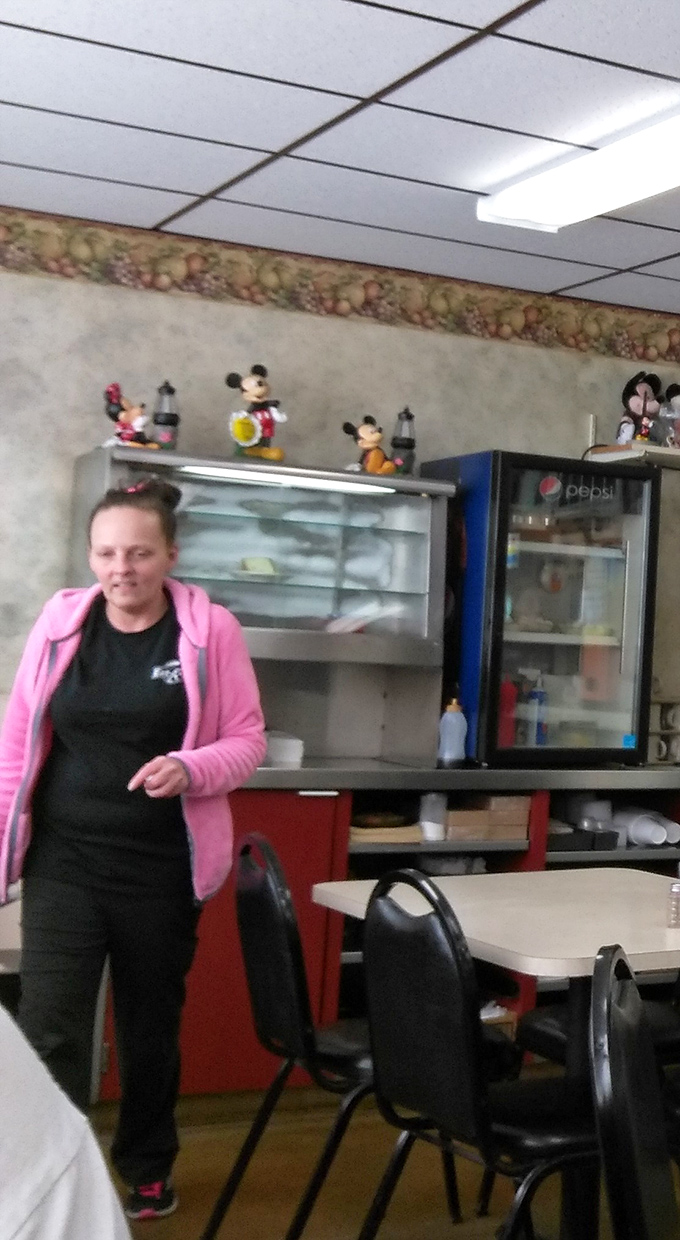 The staff at Eat-N-Run treats everyone like regulars, even on your first visit. That pink hoodie says "comfortable" while the service says "we've got this."