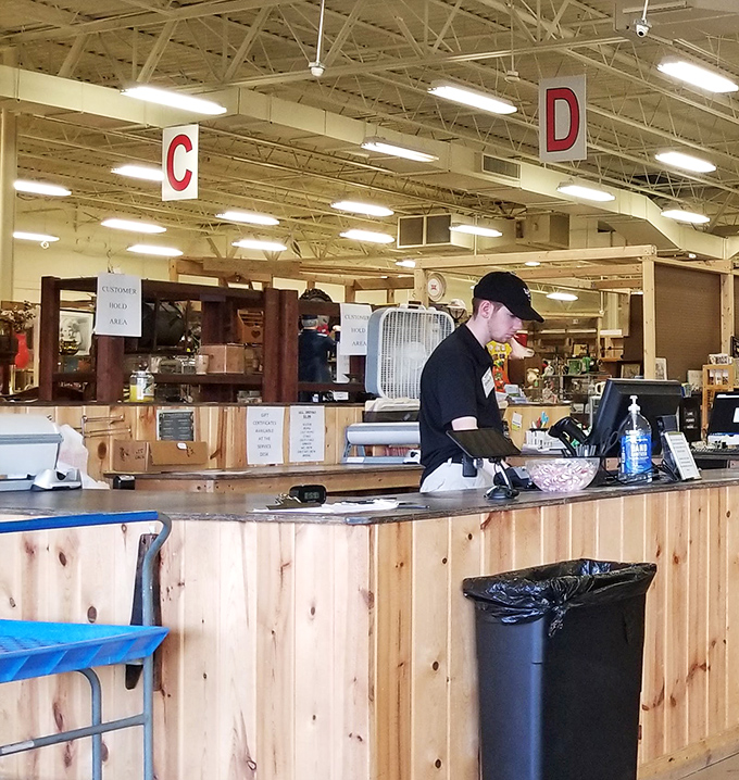 The command center where deals are sealed and treasures are tallied. Those hanging letters aren't just navigation aids&mdash;they're your alphabet to antiquing success.