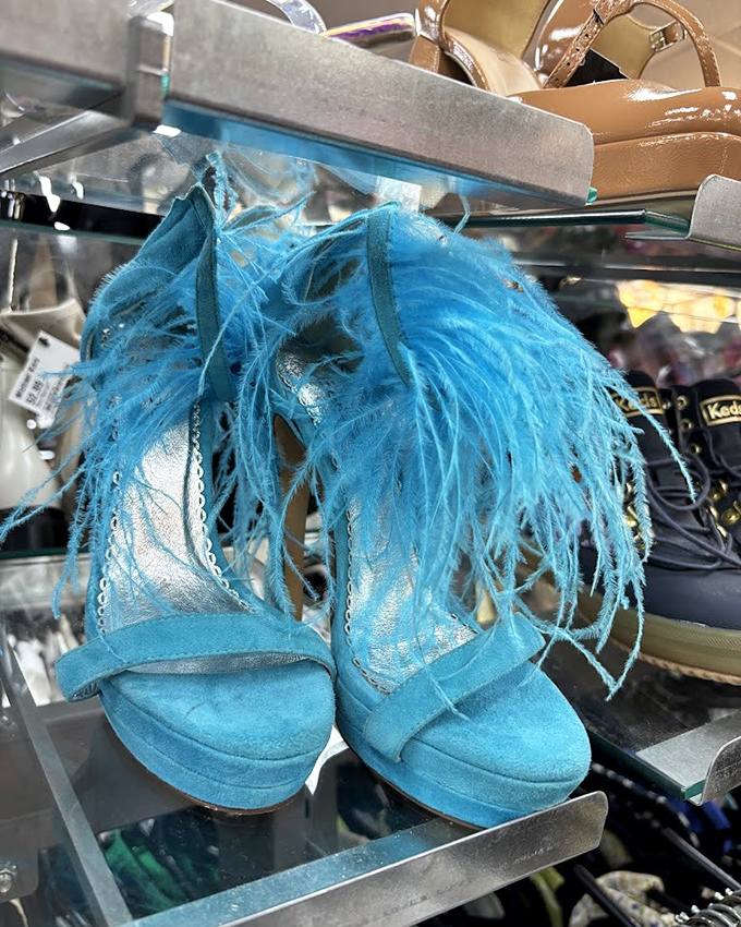 These blue feathered platforms aren't just shoes&mdash;they're conversation pieces waiting to transform an ordinary outfit into performance art.