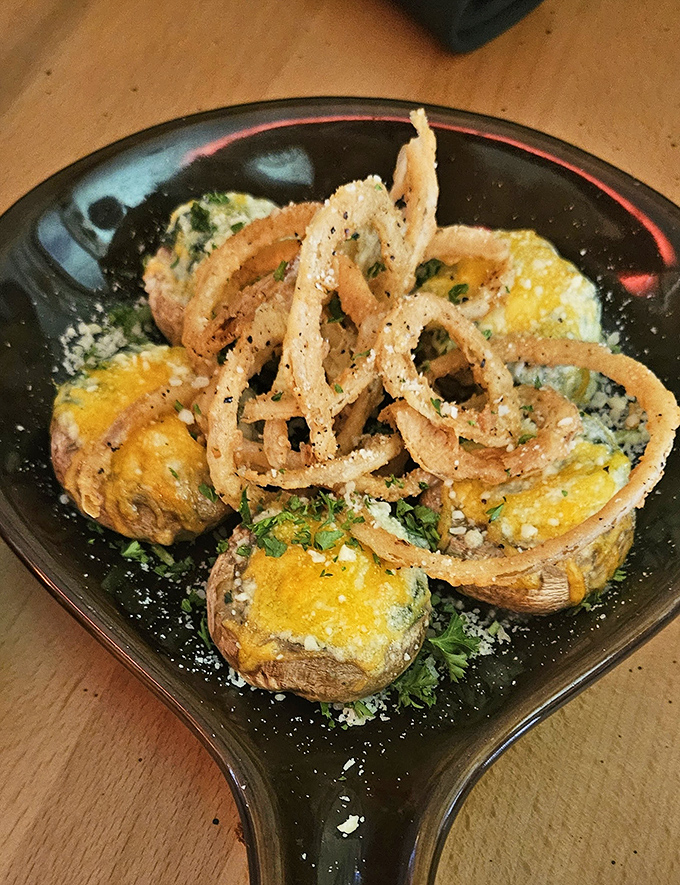 These aren't just stuffed mushrooms&mdash;they're little umami bombs topped with crispy onion straws that'll make you forget vegetables are supposed to be healthy.
