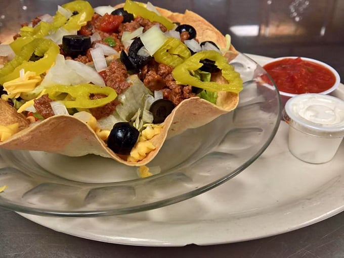 A taco salad that refuses to be a boring health food &ndash; crispy, colorful, and served with enough toppings to qualify as a complete food group.