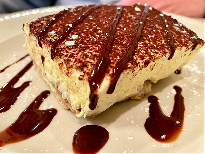 The tiramisu arrives like a cloud dusted with cocoa and drizzled with chocolate. One bite and you'll understand why the Italians named it "pick me up."