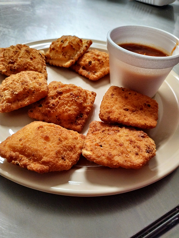 Toasted ravioli with dipping sauce&mdash;the appetizer that threatens to upstage the main event. Crispy, golden, and utterly irresistible.