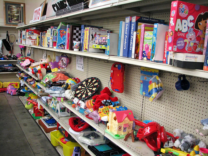Yesterday's playthings waiting for tomorrow's adventures. This toy section could stock a small daycare center or make you nostalgic for Saturday mornings past.