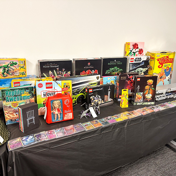 LEGO sets and collectibles arranged with unexpected care. That Barbie lunchbox might be kitsch, nostalgia, or your next quirky storage solution. 