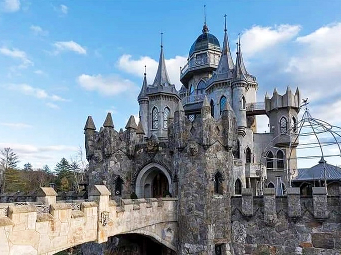 Stone bridges and medieval towers create a silhouette that would make King Arthur do a double-take. Connecticut's answer to Camelot stands proudly against blue skies.