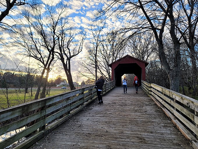 Fellow travelers pause to capture the moment, proving some experiences are still worth putting the phone down for... after one quick photo.