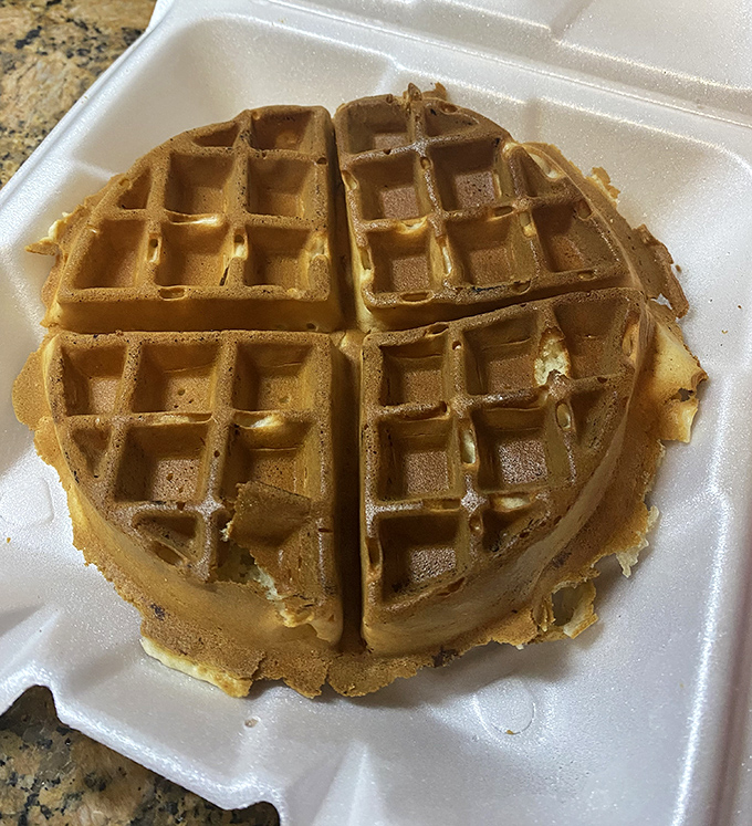 This golden waffle isn't just breakfast &ndash; it's an edible sunbeam that brightens your morning one bite at a time.