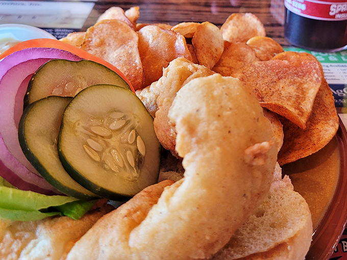 A sandwich that demands to be eaten with both hands and plenty of napkins nearby. Those homestyle chips aren't just sides&mdash;they're essential supporting actors.